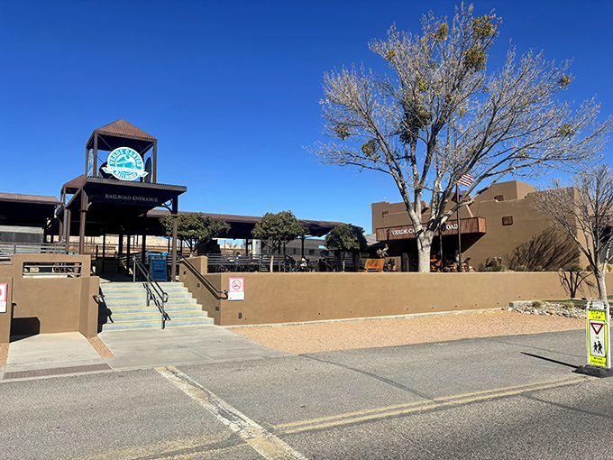The Southwestern-style depot welcomes visitors with its desert charm, promising adventures that lie just beyond those adobe walls.