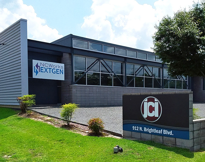 Beyond this modern facade lies a community institution where Johnston County Industries helps create employment opportunities through secondhand treasures.