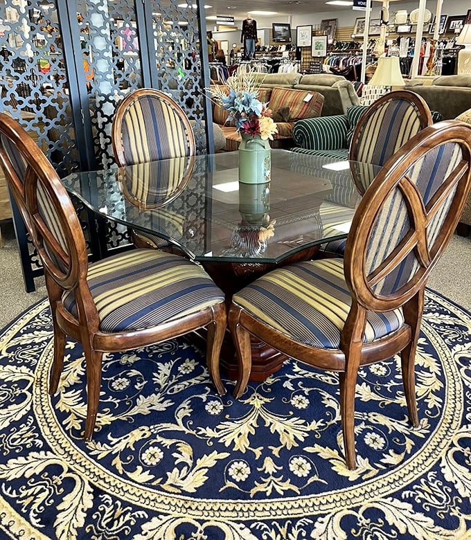 Not your grandmother's hand-me-downs! This elegant glass dining set waits patiently for someone to host their next dinner party.