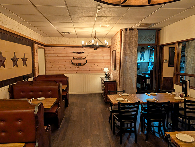 Rustic wooden walls, leather booths, and longhorn d&eacute;cor create that perfect sweet spot between "special occasion" and "comfortable enough for Tuesday night."