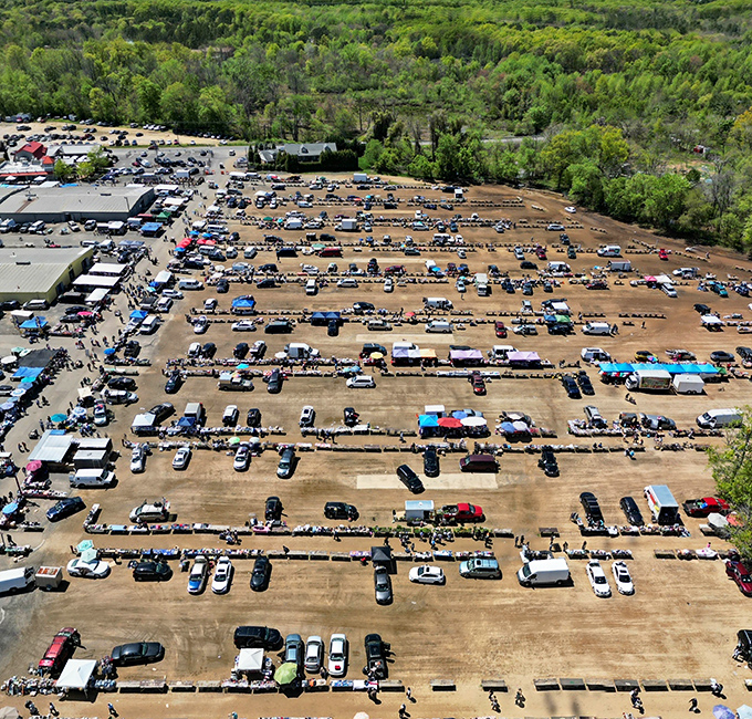From above, the true scale of Englishtown reveals itself—a small city of commerce where thousands gather weekly for the thrill of the hunt.