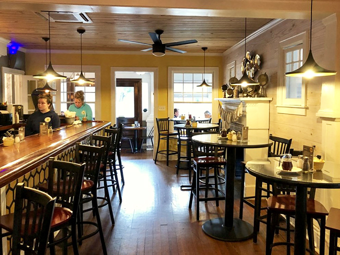 Wooden floors, warm lighting, and a bar that invites lingering—this isn't just a restaurant, it's breakfast therapy in architectural form.