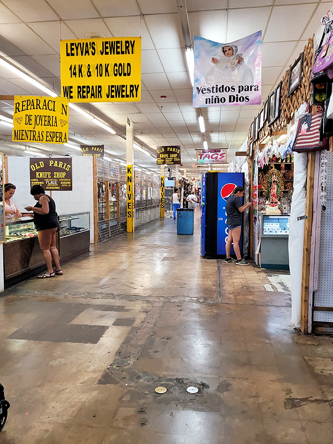 The iconic sign welcomes bargain hunters and curiosity seekers alike. Those simple words "OLD PARIS Flea Mkt." might as well read "Abandon all shopping lists, ye who enter here."