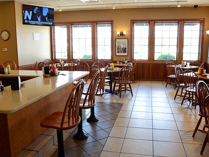 Windsor chairs and warm wood tones create that "grandma's dining room" vibe where calories don't count and second helpings are practically mandatory.