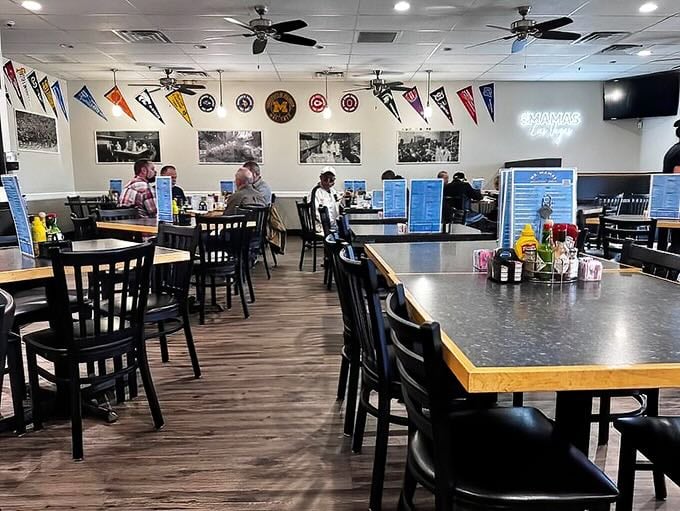 College pennants and ceiling fans create that classic American diner vibe&mdash;where conversations flow as freely as the coffee refills.