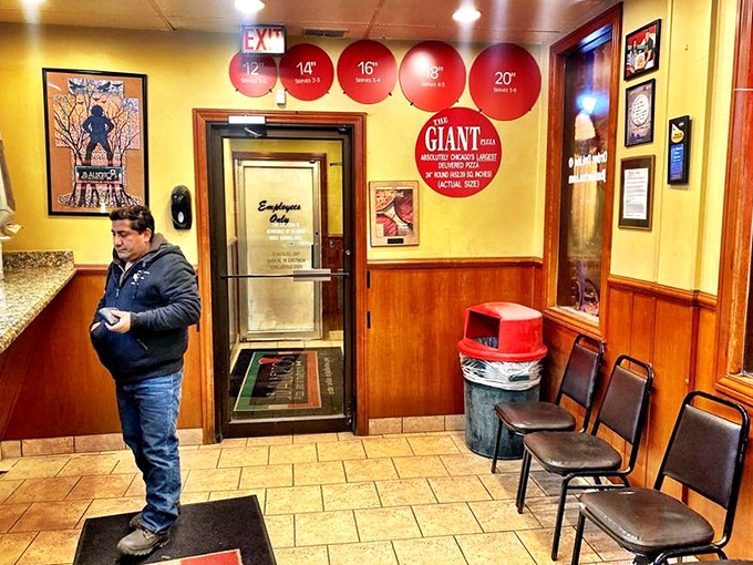 Inside, those red circles on the wall aren't just decoration&mdash;they're a pizza size chart that doubles as a challenge to your appetite.