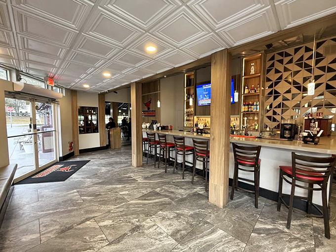 Step into a world where sleek modern design meets Brazilian warmth. The bar area beckons with promises of caipirinhas that'll make you forget you're in Orlando.