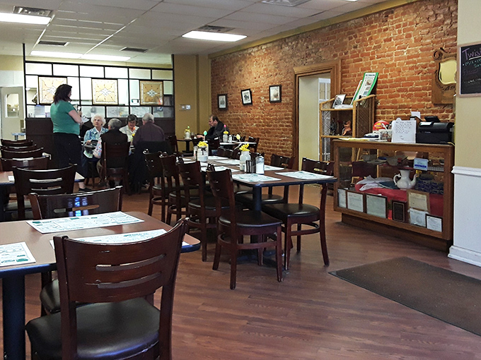 Exposed brick walls tell stories decades old while wooden chairs invite you to stay awhile. This isn't d&eacute;cor&mdash;it's history you can touch.