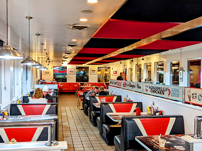 Inside, the diner's red vinyl booths and distinctive ceiling panels create that perfect nostalgic atmosphere where calories don't count and conversations flow as freely as the coffee.