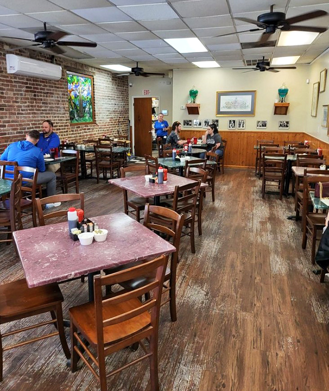 Inside, exposed brick walls and wooden wainscoting create that perfect "been-here-forever" vibe that all great breakfast joints possess.