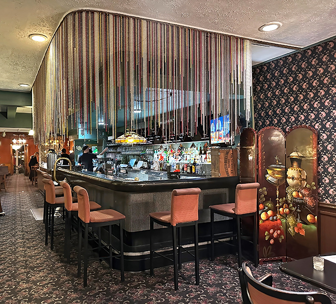 Step into a time machine&mdash;Guarino's bar area with its beaded curtains and pink chairs feels like the Italy your grandparents reminisced about.