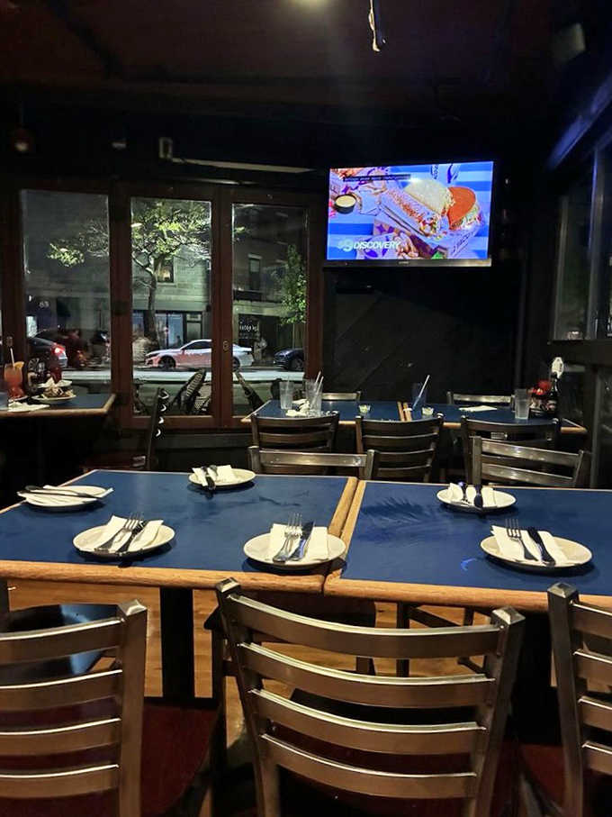 Navy blue placemats and wooden tables set the unpretentious stage where seafood takes the spotlight, not fancy decor or gimmicks.