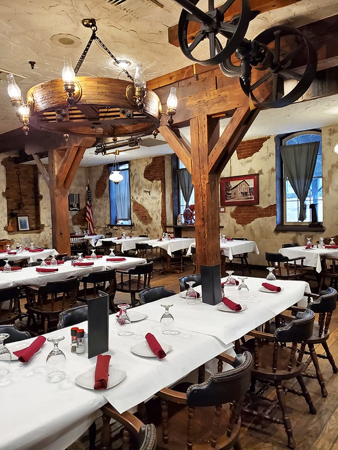 Dining among history&mdash;massive wooden beams and original mill wheels create an atmosphere where every meal feels like a special occasion.
