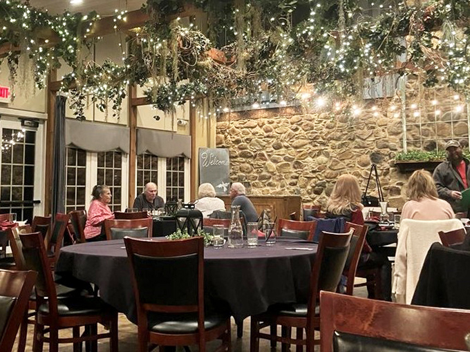 Stone walls, twinkling lights, and exposed beams create the perfect atmosphere where farm heritage meets fine dining elegance.