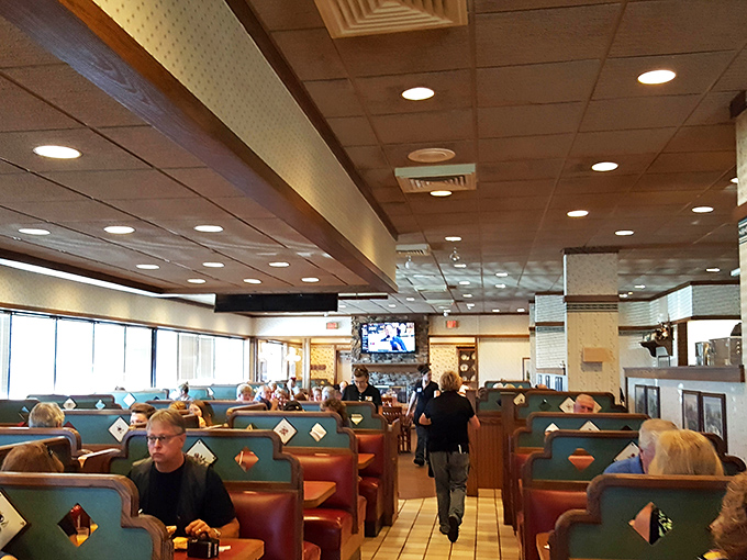 Inside, the classic diner-style booths create that perfect blend of comfort and nostalgia &ndash; the kind of place where conversations flow as freely as the coffee.