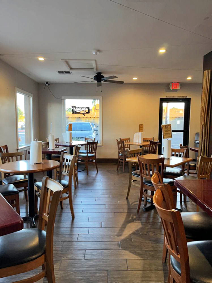 Simple wooden tables and chairs let you focus on what matters&mdash;the food. No distractions, just deliciousness waiting to happen.