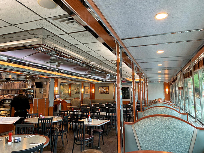 Classic diner elegance meets Queens practicality in Bel Aire's interior, where teal booths have cradled generations of locals sharing stories over bottomless coffee cups.