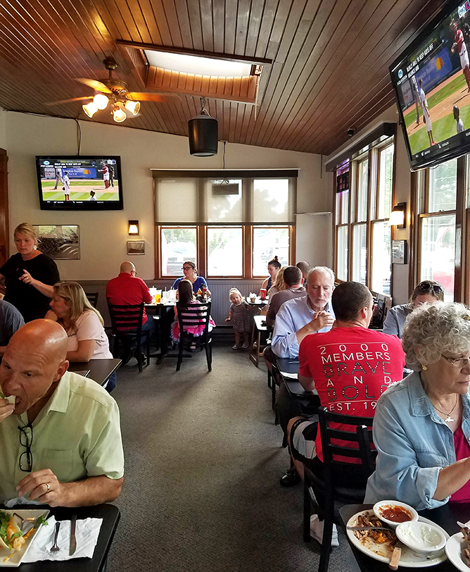 The warm wooden ceiling and bustling dining room create that perfect "everybody knows your name" vibe where Cleveland sports and comfort food unite.
