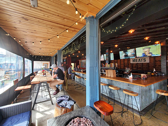 Inside Walter's, warm wood paneling and string lights create the perfect backdrop for serious meat contemplation at the corrugated metal bar.