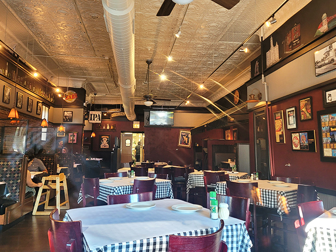 Inside, pressed tin ceilings, burgundy walls, and blue-checkered tablecloths create that quintessential Chicago Italian joint vibe that no amount of modern design could improve upon.