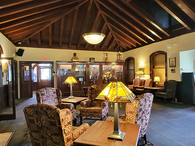 Wooden beams and craftsman lamps transform this dining room into a cozy mountain retreat where time slows deliciously.