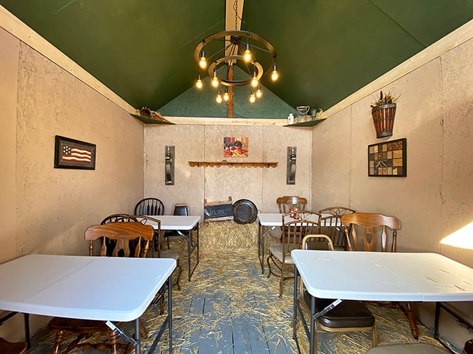 Where rustic charm meets culinary magic. The straw-covered floor and mismatched chairs create the perfect backdrop for the star of the show: seriously good BBQ.