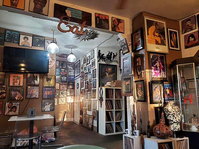 A shrine to music and culture adorns every inch of wall space, creating an atmosphere where your ears feast while your stomach waits its turn.