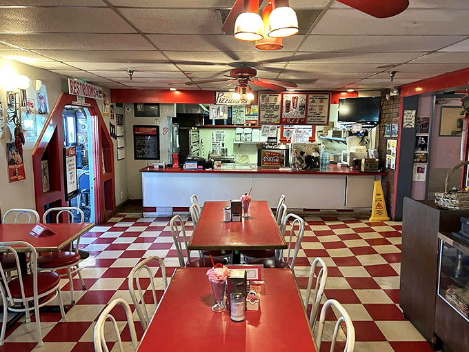 Classic red tables and checkered floors transport you back to simpler times, when rock 'n' roll was young and milkshakes came with the extra in the metal cup.