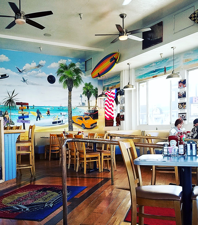 Surfboards and sunshine fill this beachy haven where breakfast dreams come true. The mural alone is worth the trip!