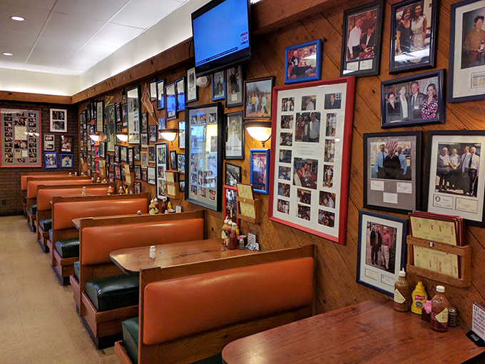 Orange vinyl booths and walls covered with decades of memories&mdash;this isn't d&eacute;cor you can buy, it's history you can feel.