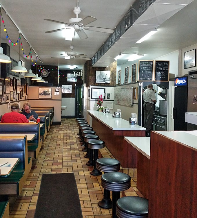 Step inside and travel back in time – the counter stools, ceiling fans, and wood-paneled walls create the perfect backdrop for Erie's favorite comfort food experience.