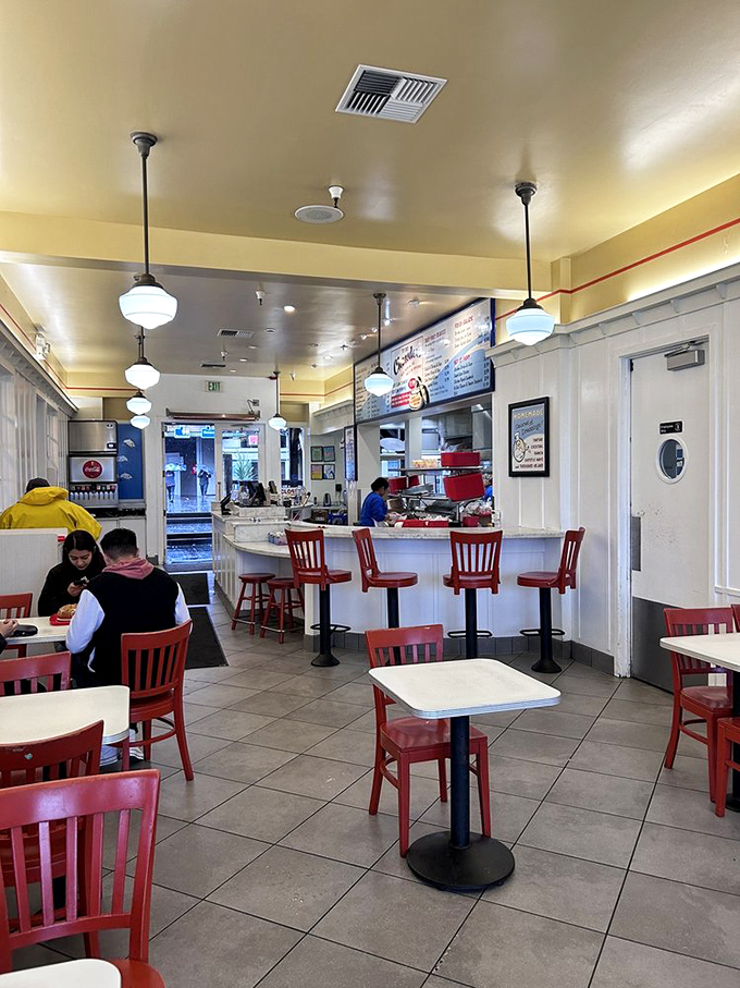 Narrow, efficient, and buzzing with breakfast energy – this kitchen corridor is where morning magic happens without pretense or fanfare.