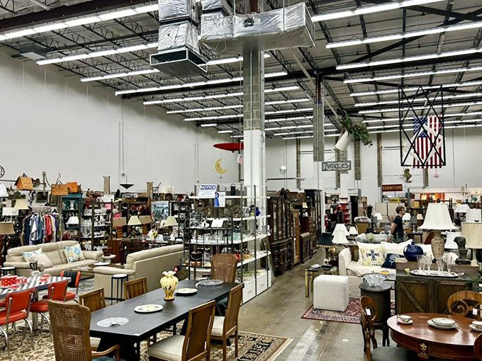 "Industrial ceilings soar above carefully arranged furniture vignettes. It's like someone organized your dream garage sale with actual taste."