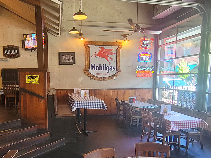 Vintage Mobilgas signs and checkered tablecloths create that perfect "grandma's kitchen meets roadside gem" vibe. Nostalgia you can sit in while anticipating greatness.
