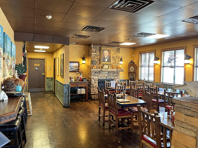 Step inside and the warm yellow walls, stone fireplace, and wooden furniture instantly whisper, "Stay awhile, friend. The pork chops are worth it."