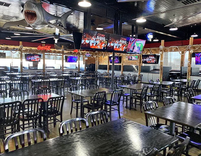 That menacing shark overhead sets the tone perfectly &ndash; you're entering waters where seafood reigns supreme and napkins surrender immediately.