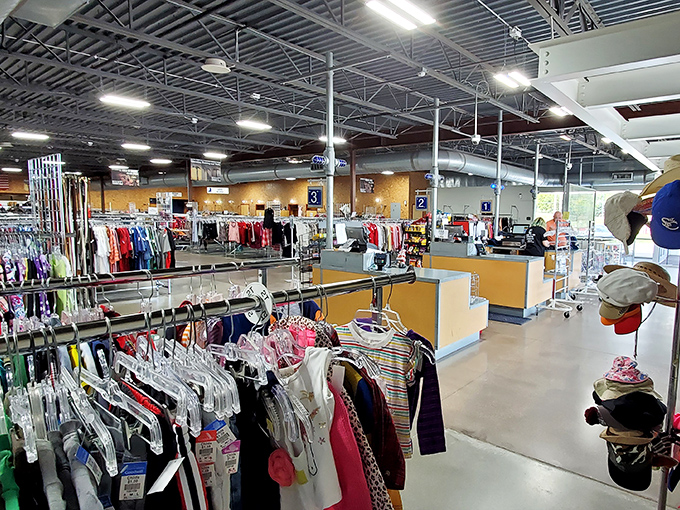 Rows upon rows of meticulously organized clothing await, proving that "secondhand" and "chaotic" don't have to be synonymous.