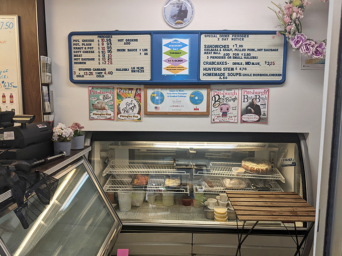 Behind this humble counter lies a treasure trove of Eastern European delights. The display case is like a museum exhibit of comfort food masterpieces.