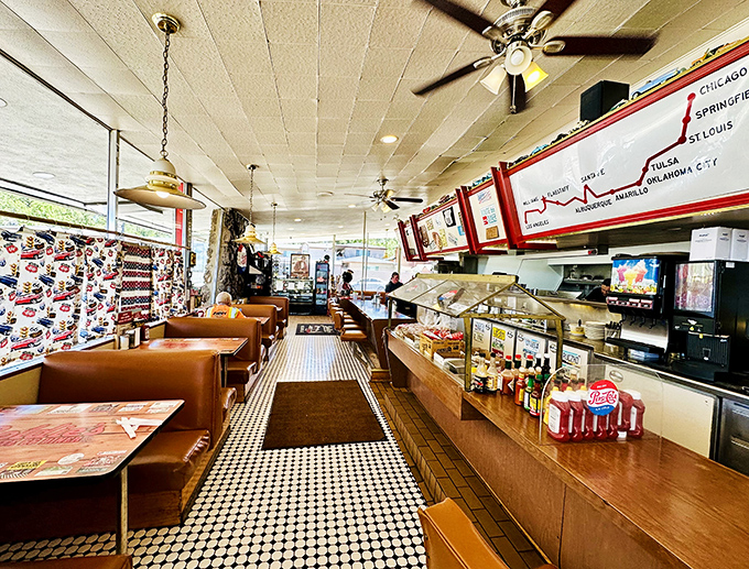 Step inside and time-travel to the 1950s &ndash; classic checkered floors, vintage Route 66 maps, and cozy booths create the perfect backdrop for American diner magic.
