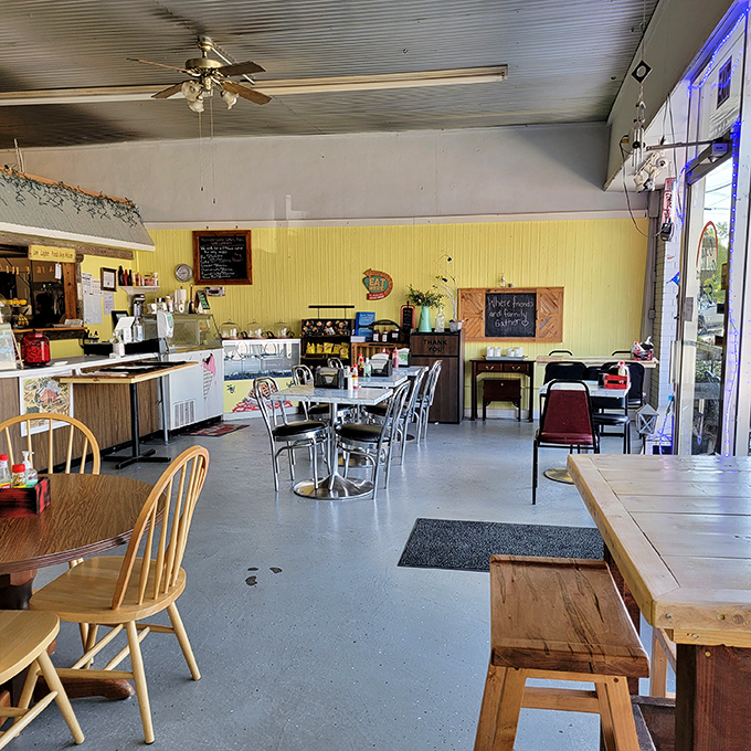 Inside, yellow-paneled walls and mismatched furniture create that "grandma's kitchen" vibe where calories don't count and conversations flow as freely as the coffee.