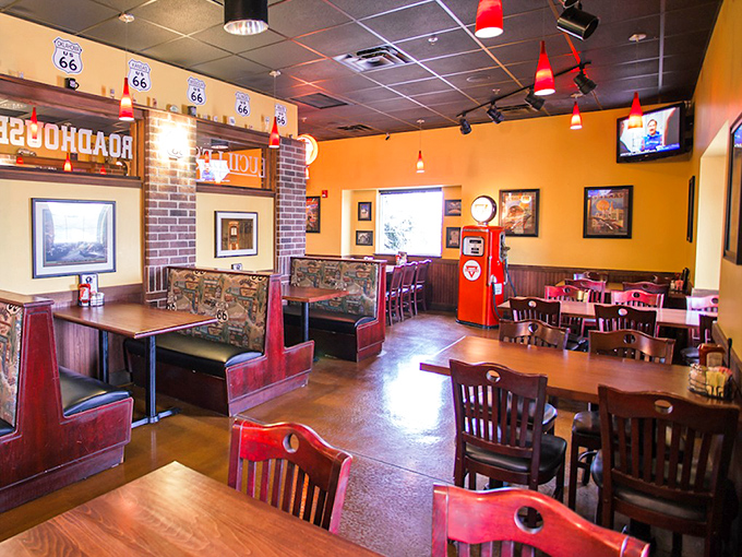 Step inside and you're greeted by warm yellow walls, Route 66 memorabilia, and wooden booths that invite you to settle in for a proper American meal.