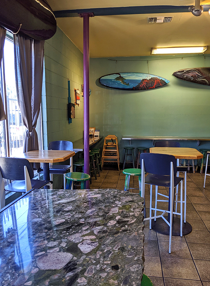 Surfboards adorn mint-green walls in this no-frills interior where the focus is squarely on what matters: exceptional tacos.