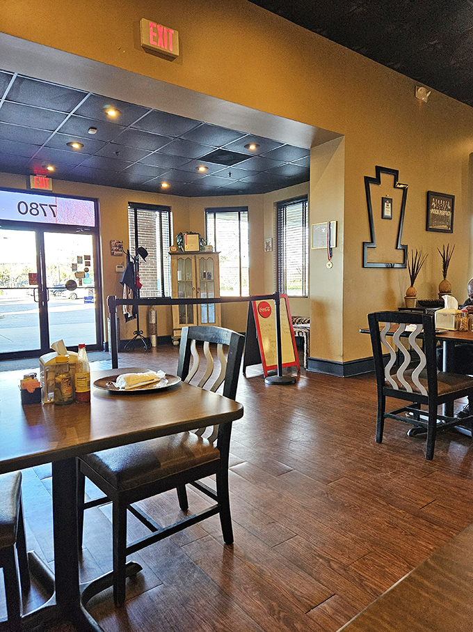 Inside, warm golden walls and distinctive wave-patterned chairs create an atmosphere that says, "Stay awhile, calories don't count when you're among friends."