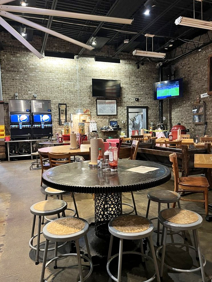 Industrial chic meets barbecue comfort. Those exposed brick walls have absorbed decades of smoky goodness, becoming flavor historians in their own right.