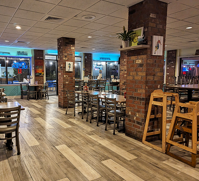 Exposed brick and wood floors create the kind of comfortable atmosphere where lingering over lunch becomes an afternoon tradition.