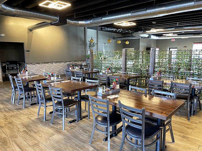 Modern industrial meets cozy comfort in this thoughtfully designed space where wooden tables invite you to linger over steaming bowls of Vietnamese goodness.