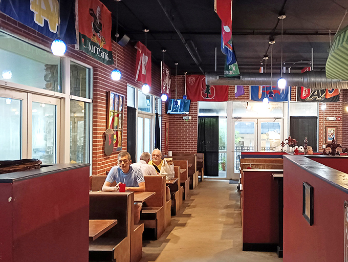 College pennants hanging from exposed brick walls prove you can love both football and phenomenal gumbo simultaneously.