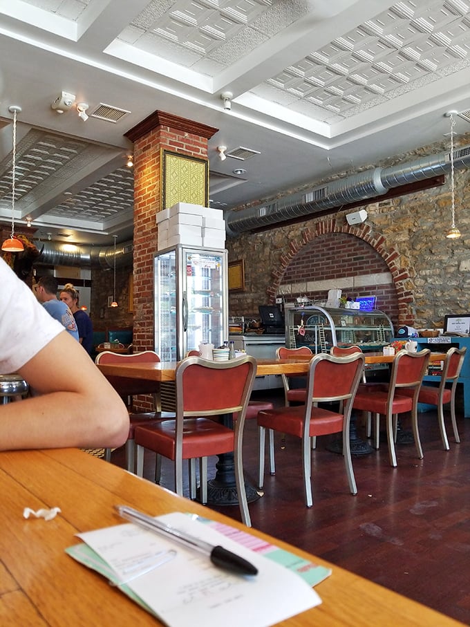 Counter seats: the VIP section of any great diner. At Ladybird, they're front-row tickets to the culinary show behind that gorgeous brick archway.