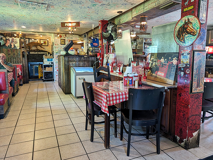 Inside, horse racing memorabilia and checkered tablecloths create that perfect "Kentucky joint where locals eat" atmosphere. No interior designer needed when the food does the talking.