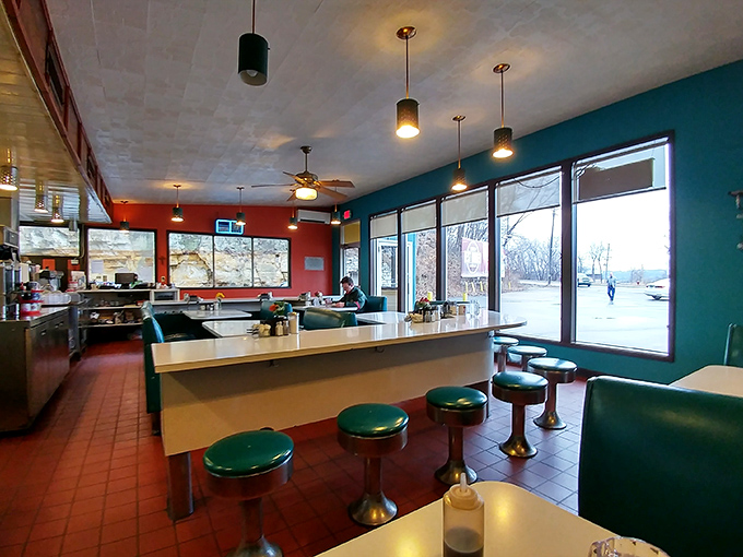 Classic diner aesthetics meet modern comfort inside Oasis Cafe. Those green swivel stools have witnessed countless first dates, family celebrations, and "I-can't-believe-I-ate-the-whole-thing" moments.